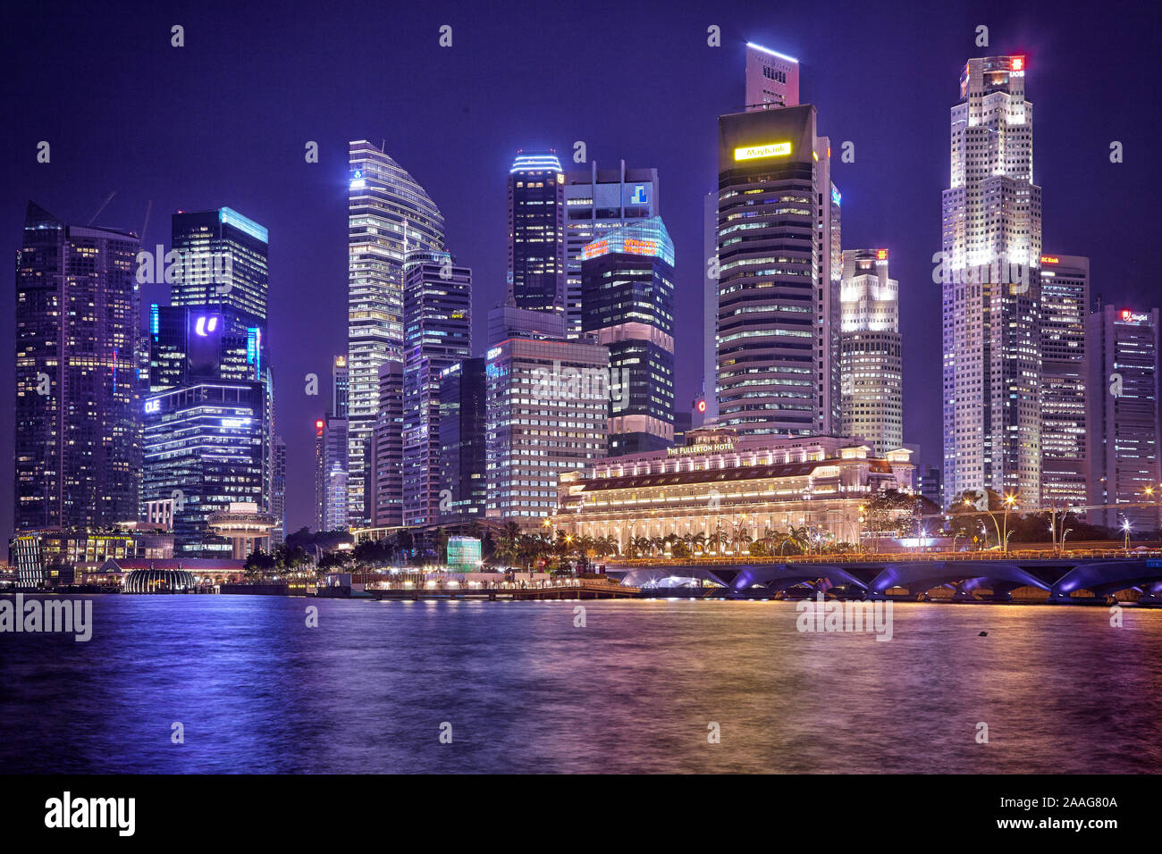 SINGAPORE - JULY 12: Singapore by night - the CBD from across Marina ...