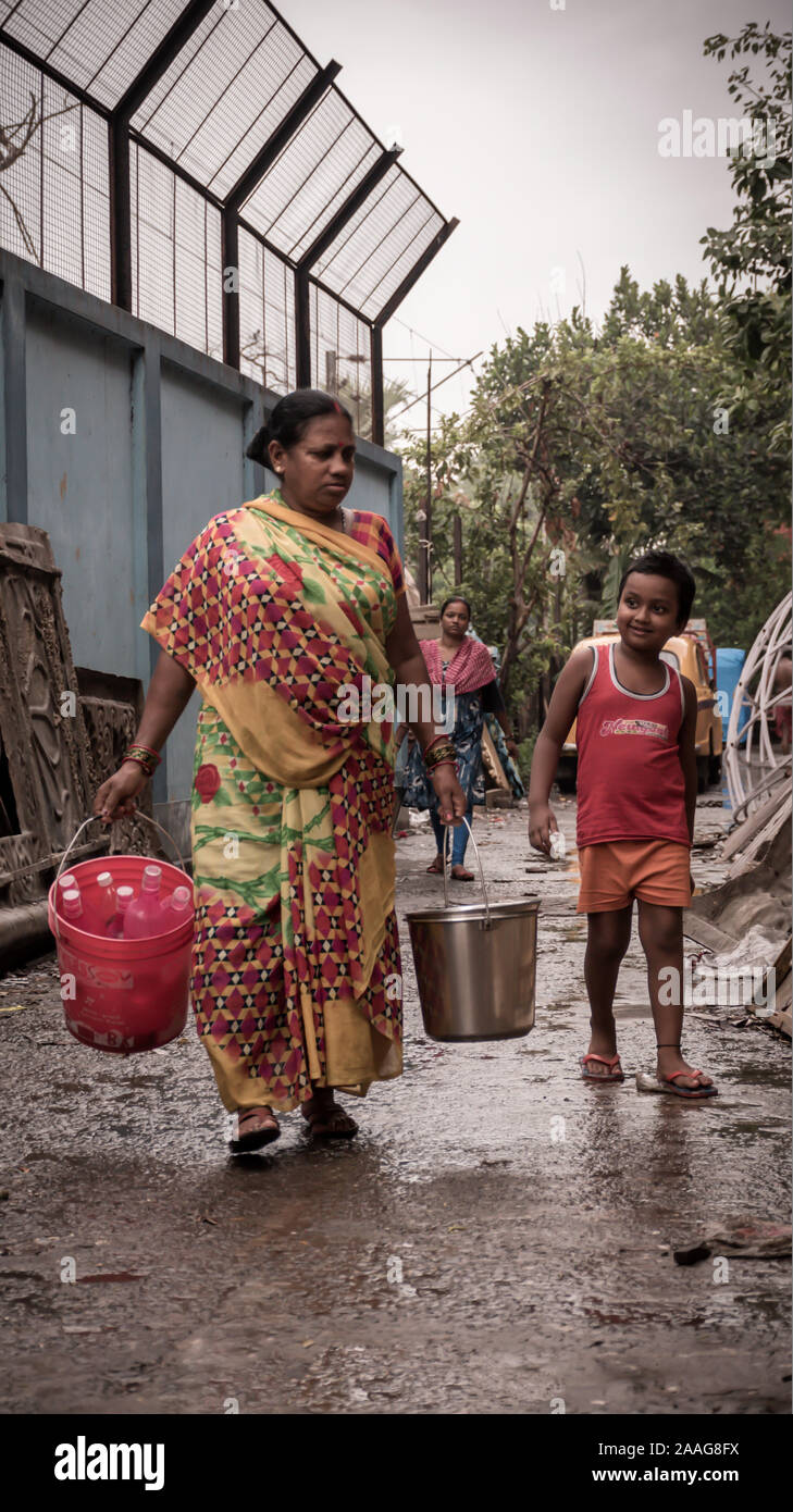 Kolkata, India. Indian woman Carrying Water Buckets. August 2019 Stock ...