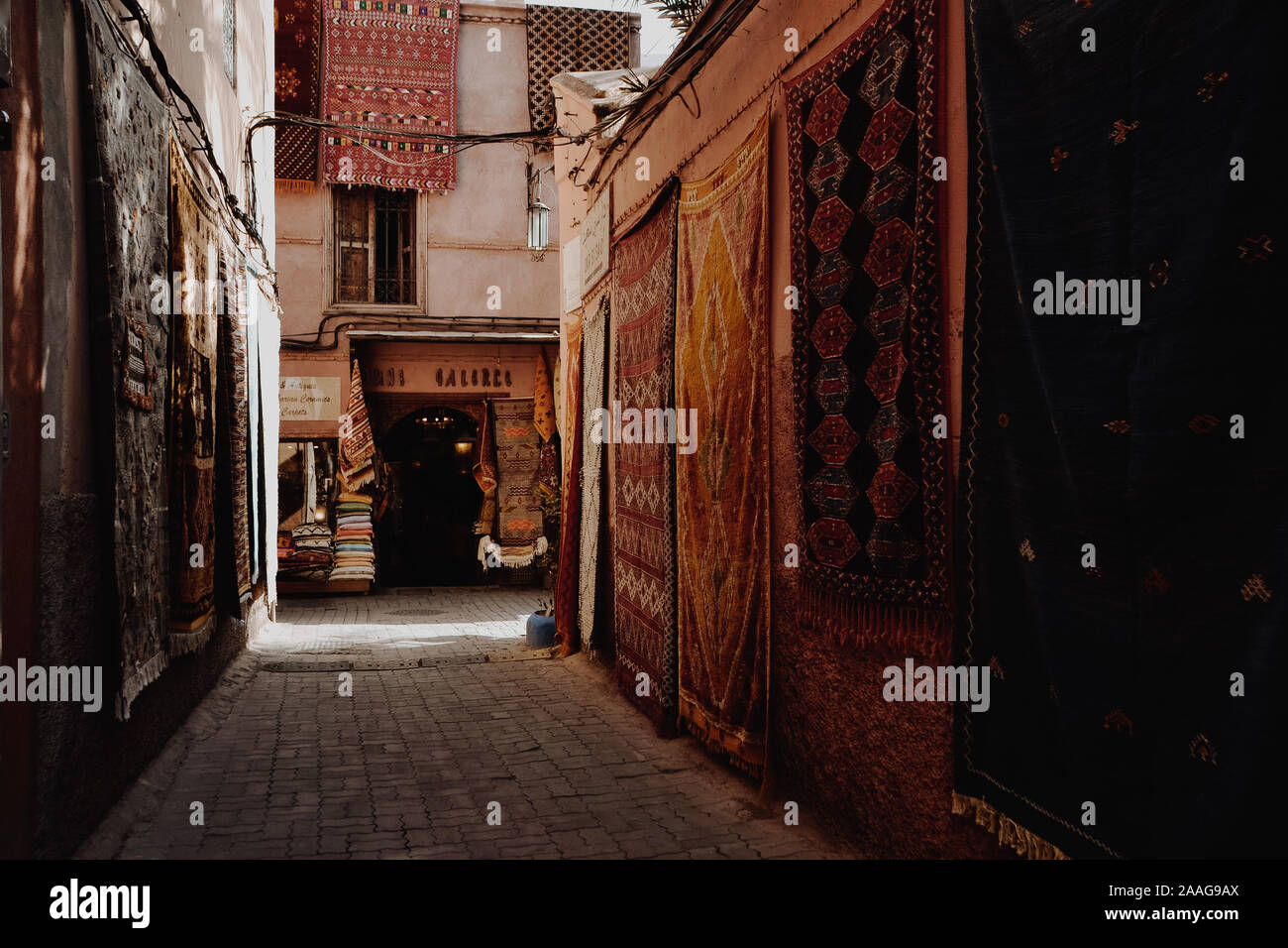 Handmade carpet hanging on the street Stock Photo - Alamy