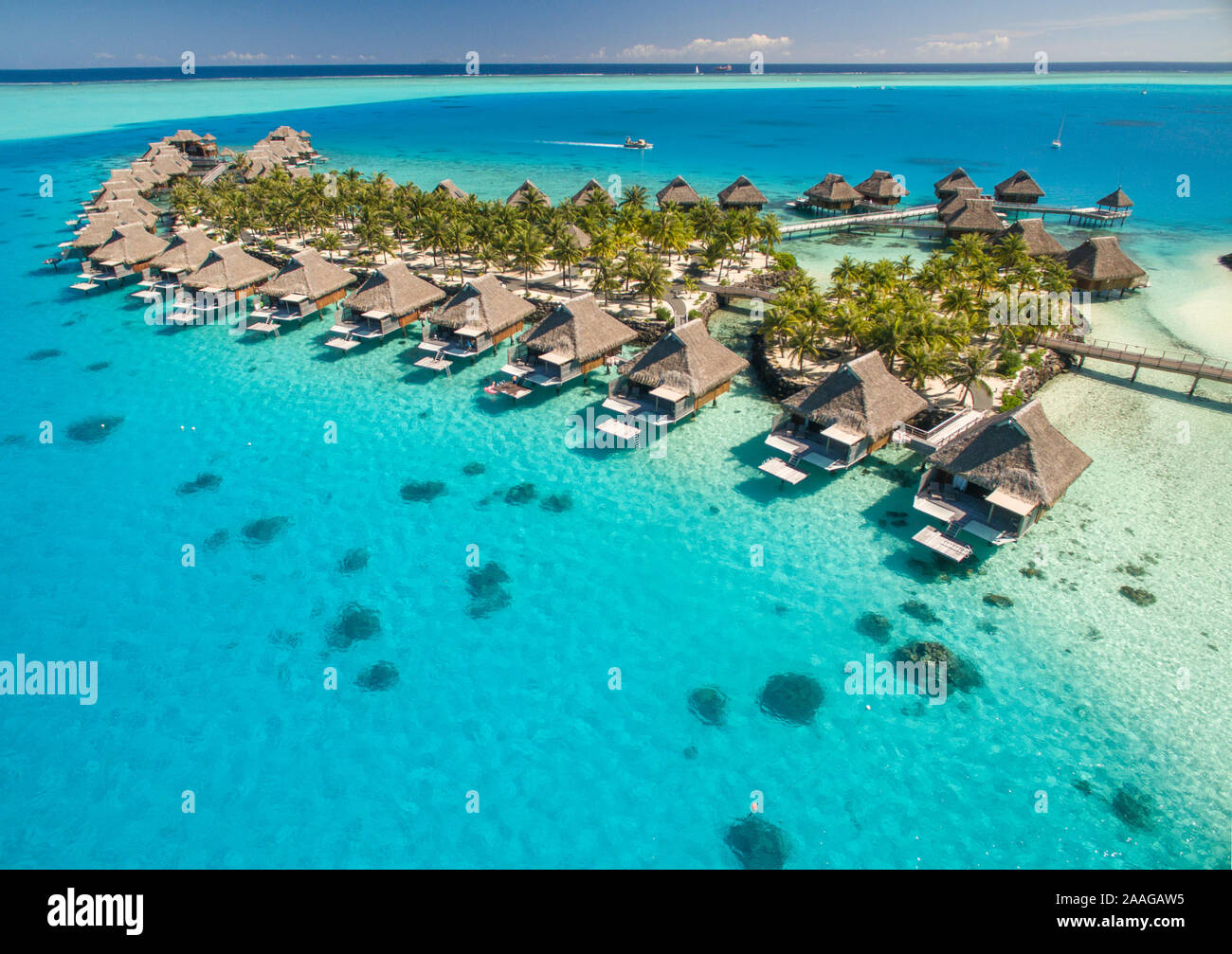 Aerial views of the CONRAD BORA BORA luxury hotel - overwater bungalows ...