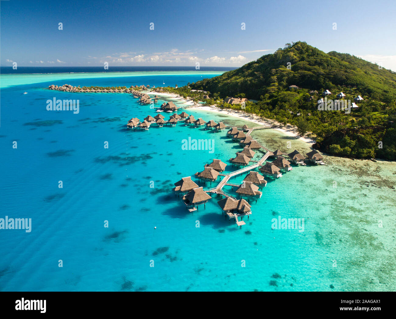 Aerial views of the CONRAD BORA BORA luxury hotel - overwater bungalows ...