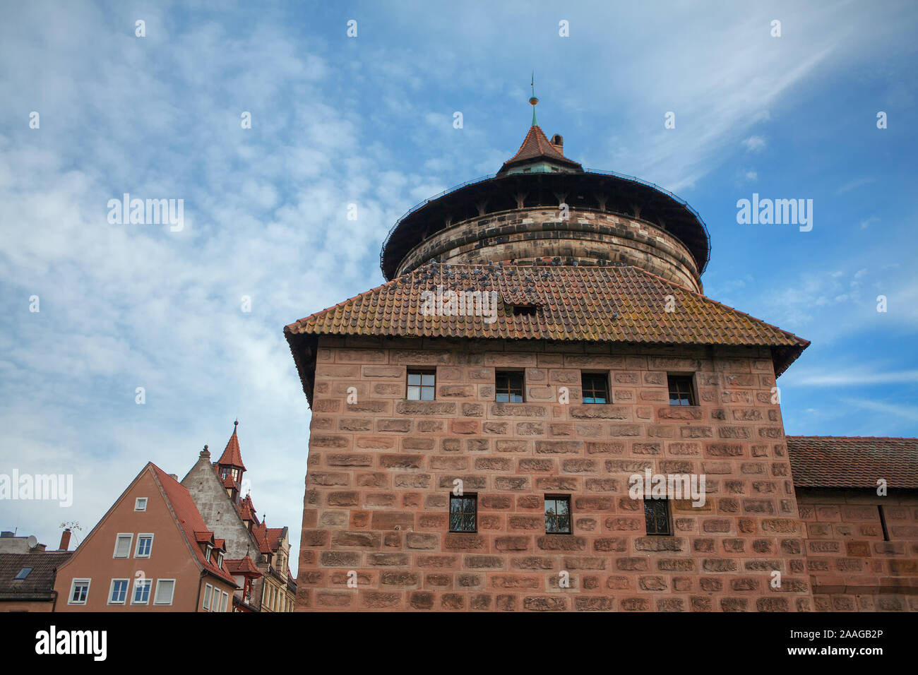 architecture of medieval town with red tiled roof Stock Photo - Alamy