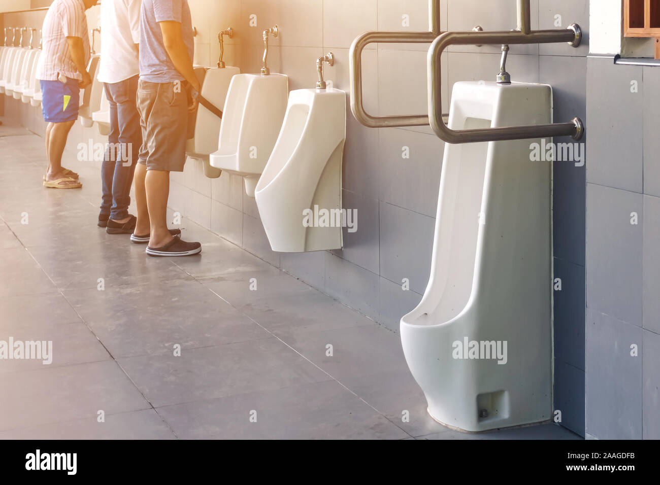 Clean and modern public men toilet with friendly design for people with ...