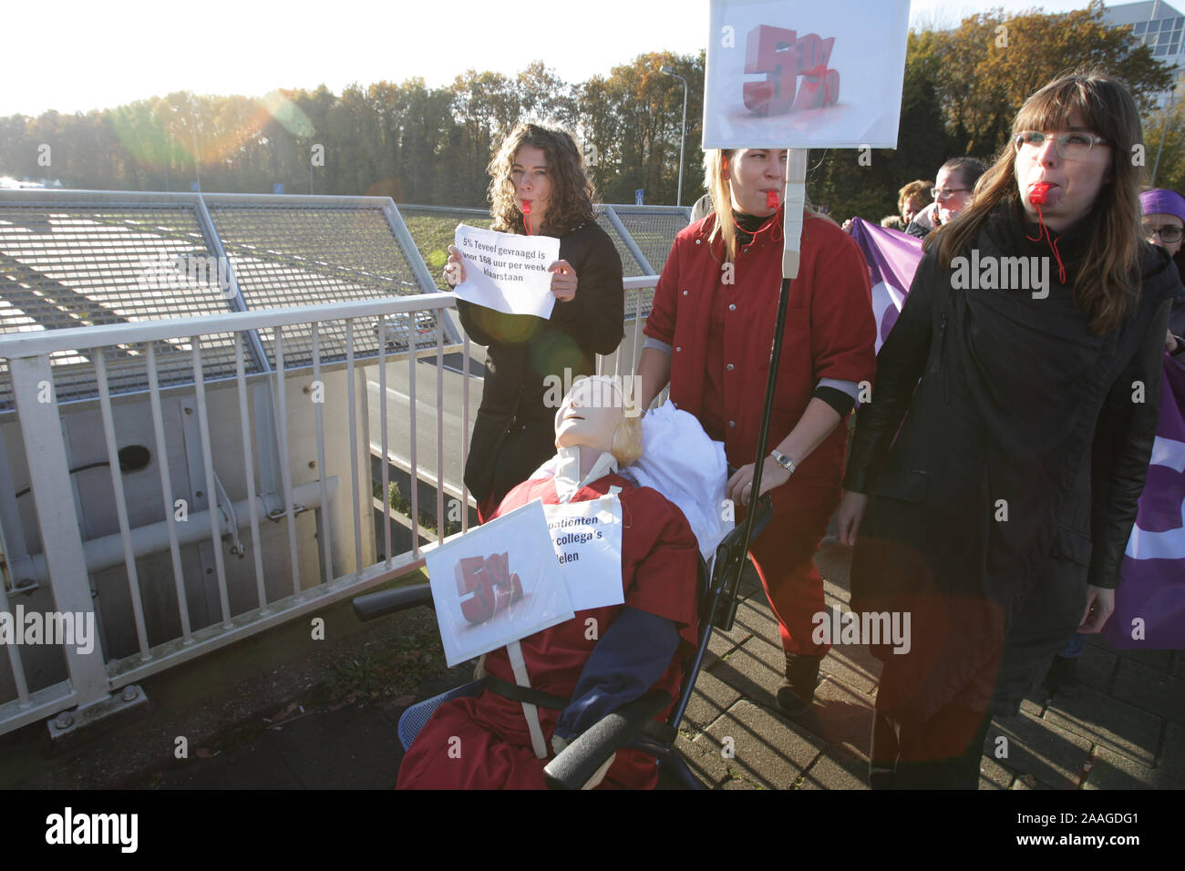 Healthcare workers with fake patient doll take part during national ...