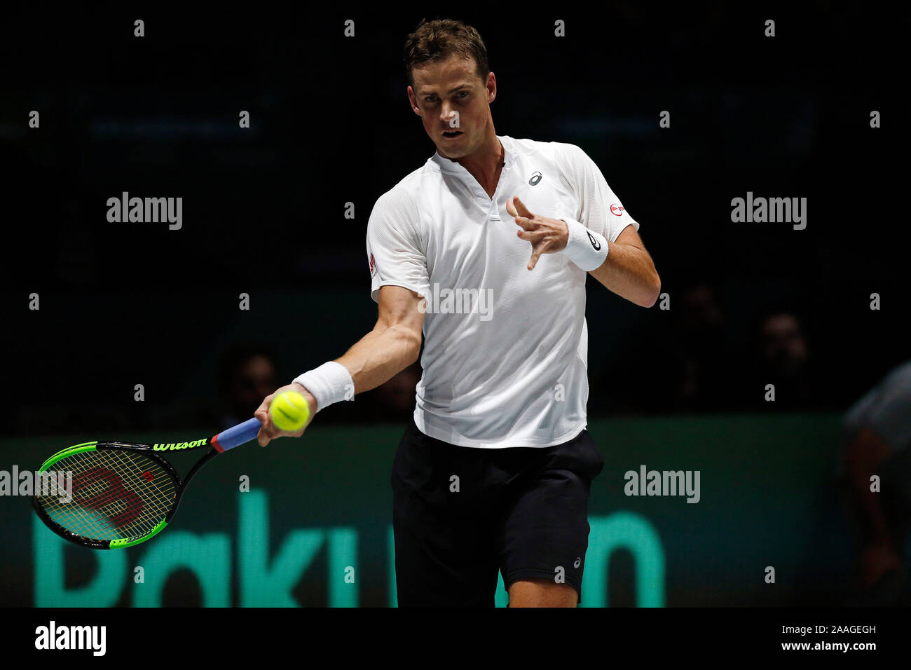 Vasek Pospisil of Canada plays a forehand against John Millman of ...