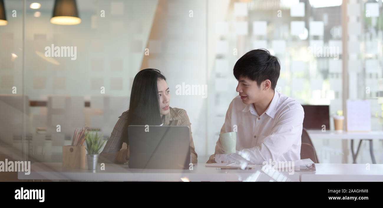 Young professional business team discussing the strategy together in ...