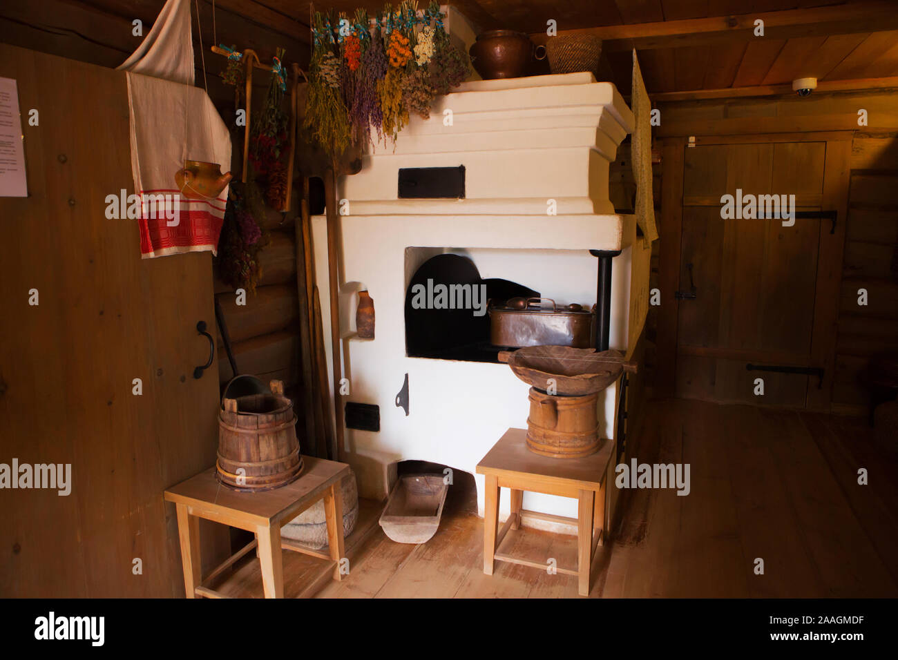 The interior of the old Russian log cabin in the Pushkin village of ...