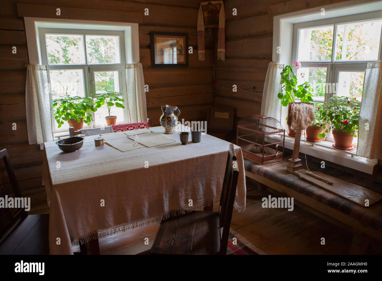 The interior of the old Russian log cabin in the Pushkin village of ...