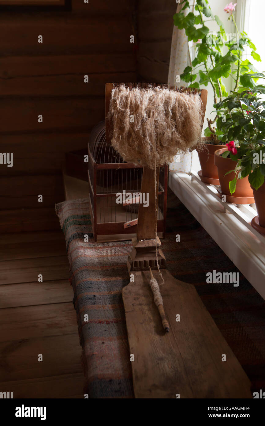 The interior of the old Russian log cabin in the Pushkin village of ...