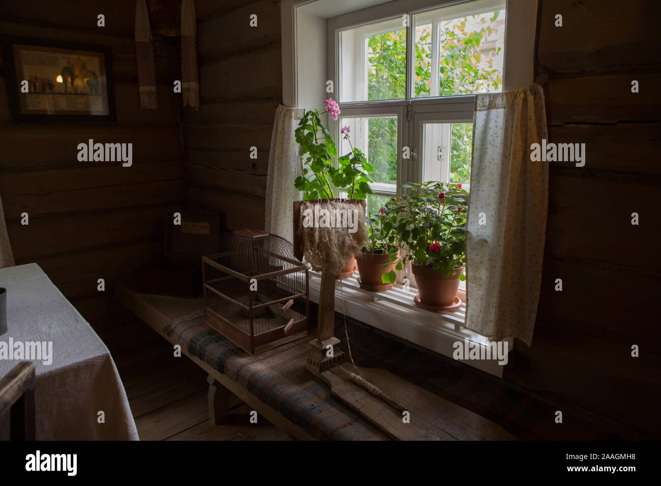 The interior of the old Russian log cabin in the Pushkin village of ...
