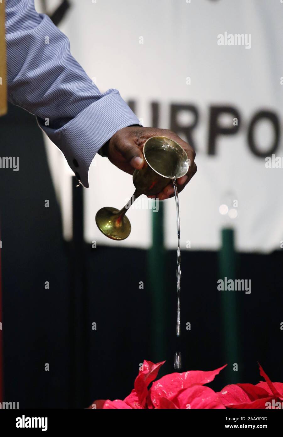 Pouring libations hi-res stock photography and images - Alamy