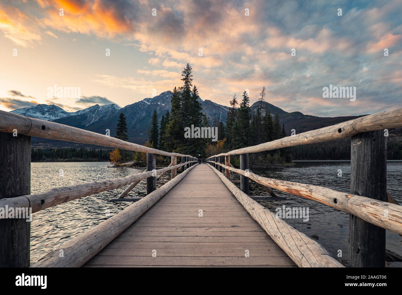 Wooden bridge in Pyramid lake with colorful sky at evening. Jasper ...