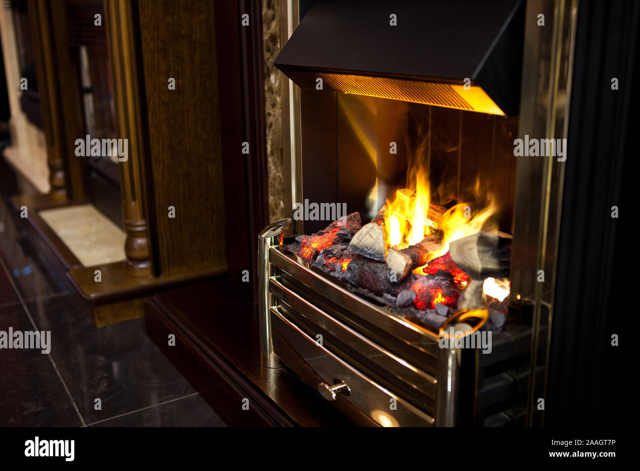 Fireplace with burning fire .Warm home interior at night Stock Photo ...
