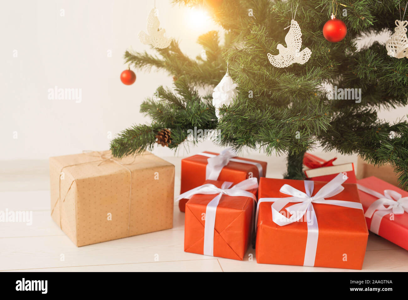 Christmas gift boxes and fir tree, top view Stock Photo - Alamy