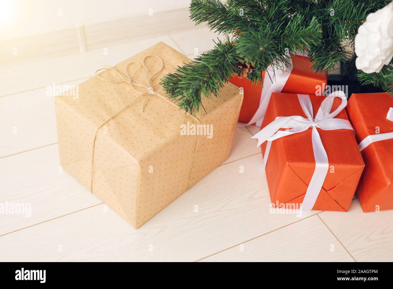 Christmas gift boxes and fir tree, top view Stock Photo - Alamy