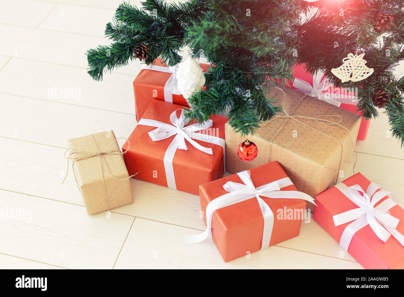 Christmas gift boxes and fir tree, top view Stock Photo - Alamy
