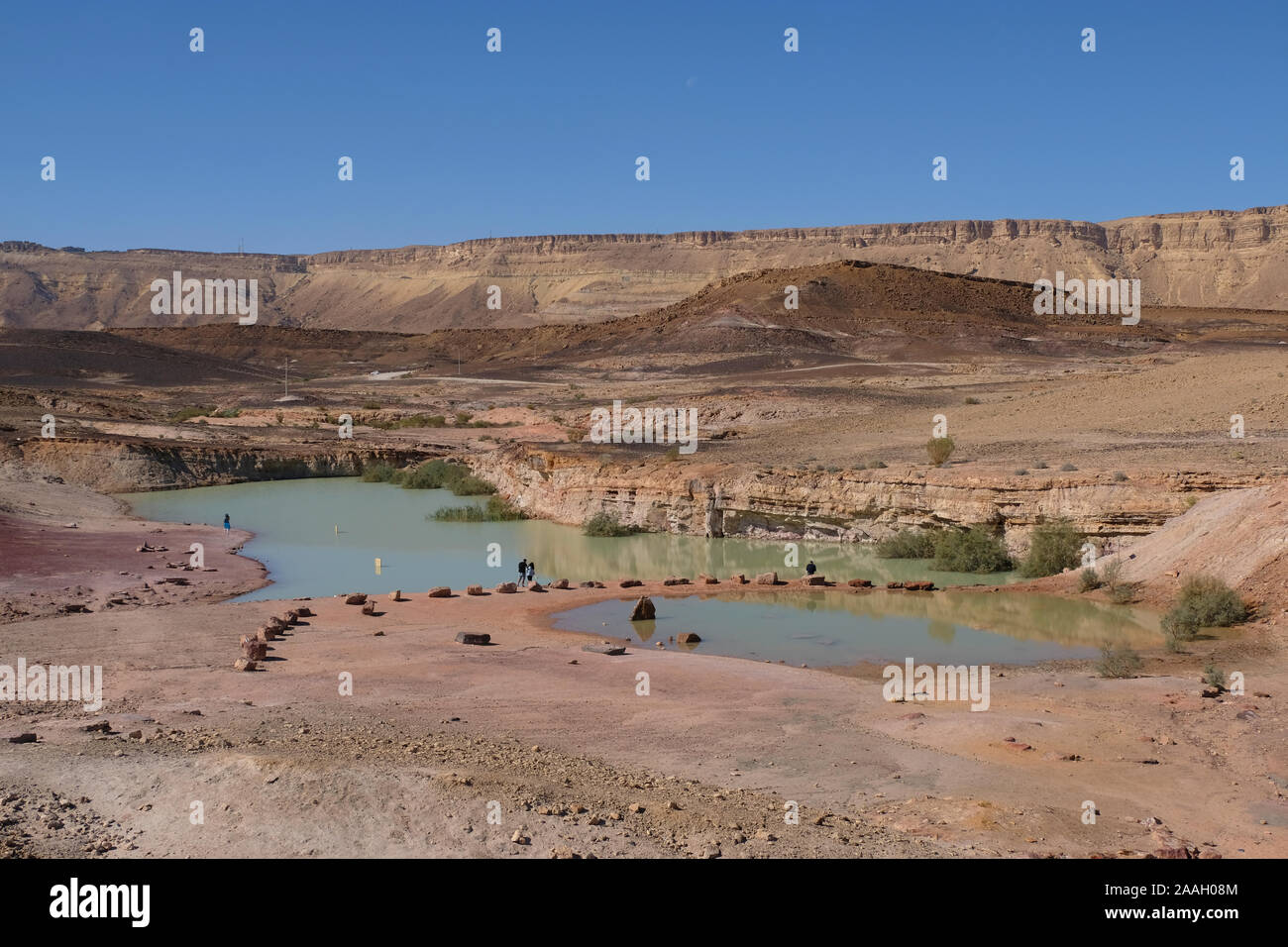 View of kaolonite quarries filled with water after rainfall in Makhtesh ...
