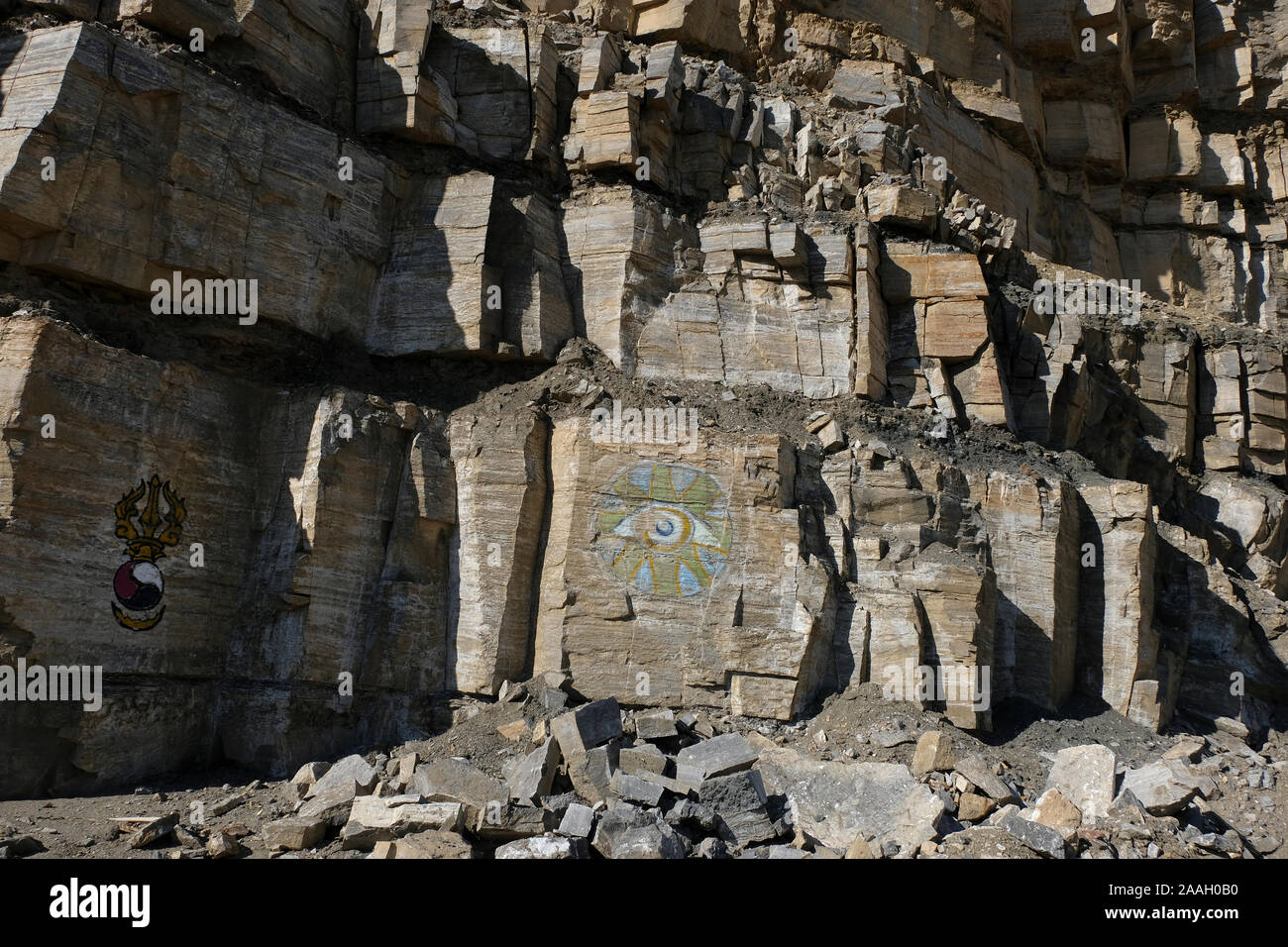 Gypsum layers in a rock in an abandoned gypsum quarry which was first ...
