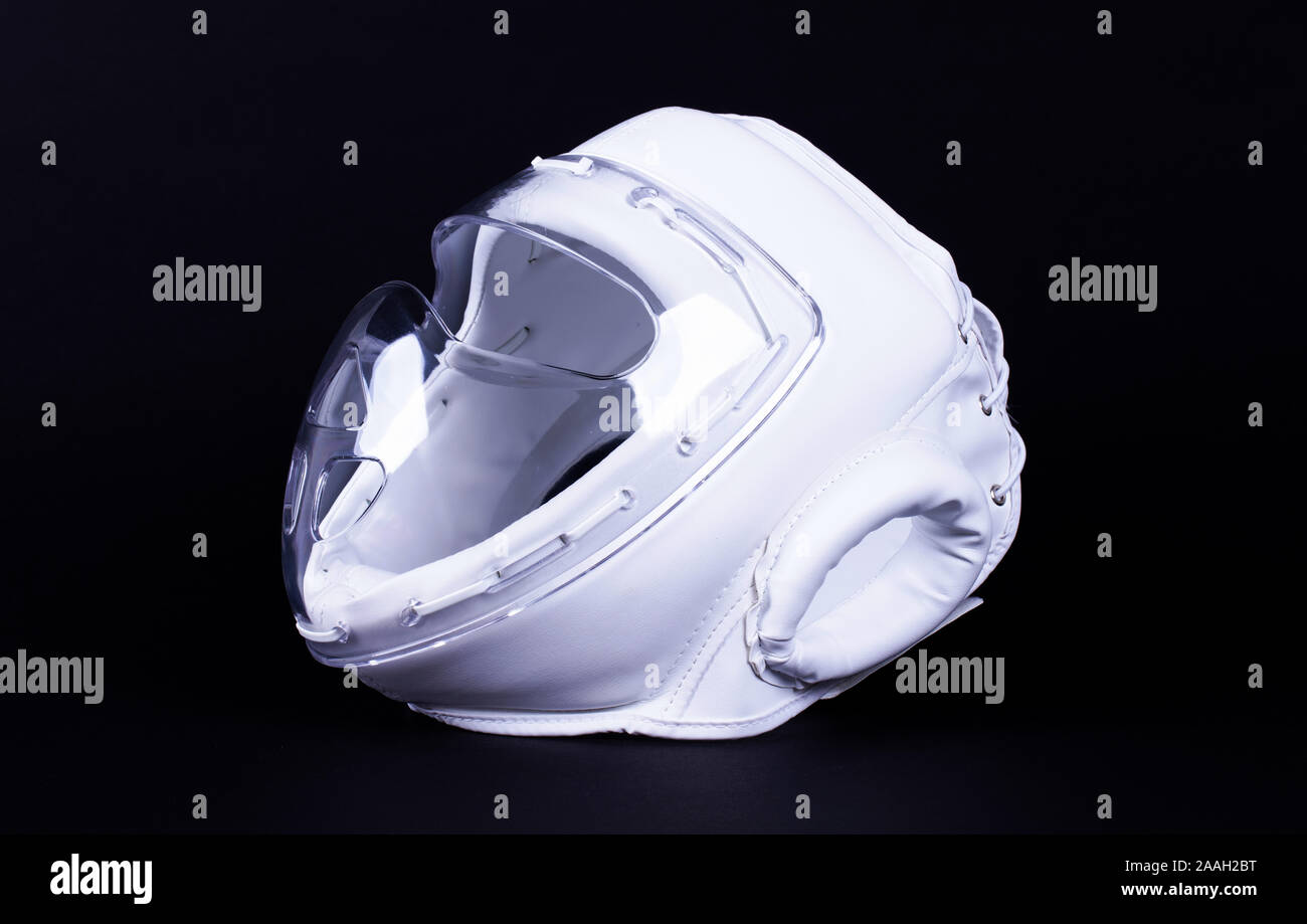 White boxing helmet, modern headgear isolated on black Stock Photo - Alamy
