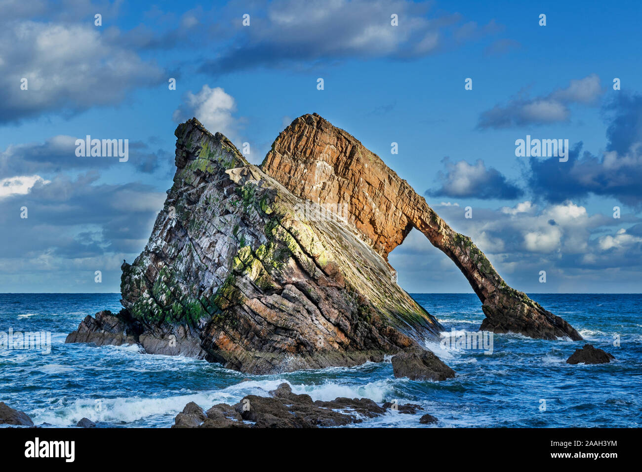 BOW FIDDLE ROCK PORTKNOCKIE MORAY SCOTLAND ROCK DETAIL WITH BLUE SKY ...