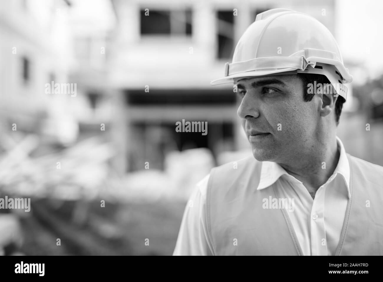 Handsome Persian man construction worker at the construction site Stock ...