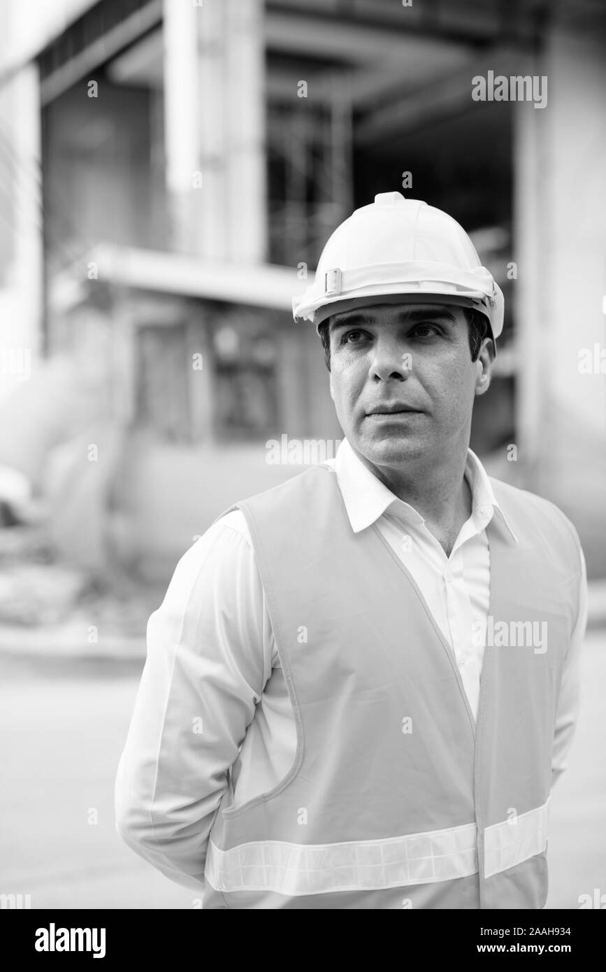 Handsome Persian man construction worker at the construction site Stock ...