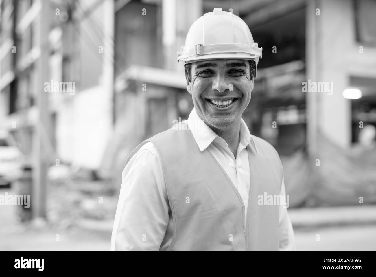 Handsome Persian man construction worker at the construction site Stock ...