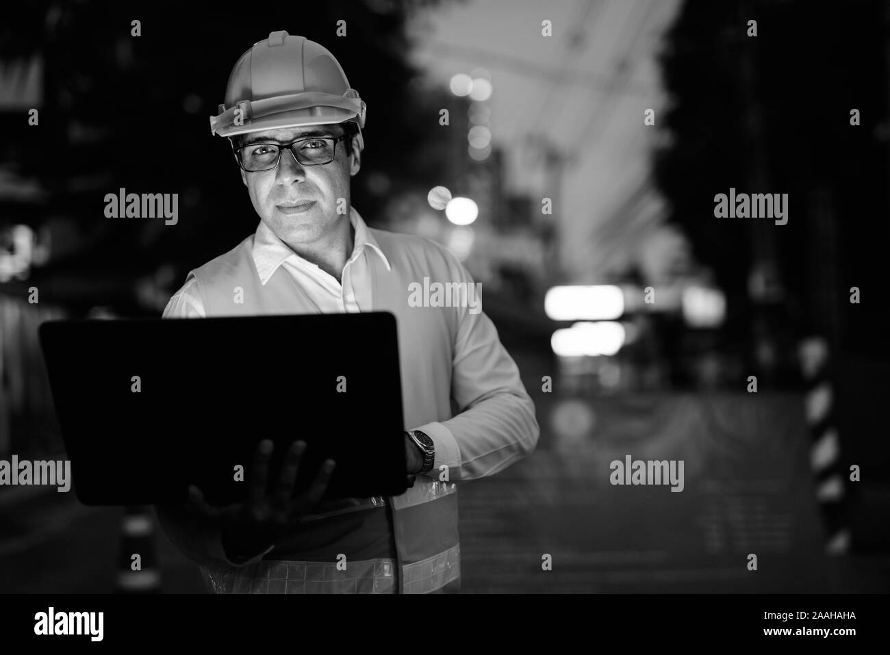 Handsome Persian man construction worker at the construction site at ...