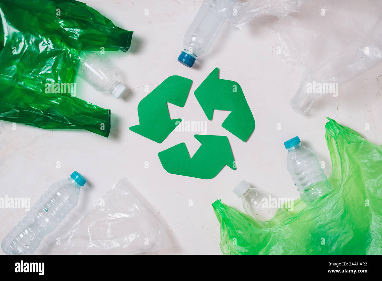 Eco concept with recycling symbol on table background top view Stock ...