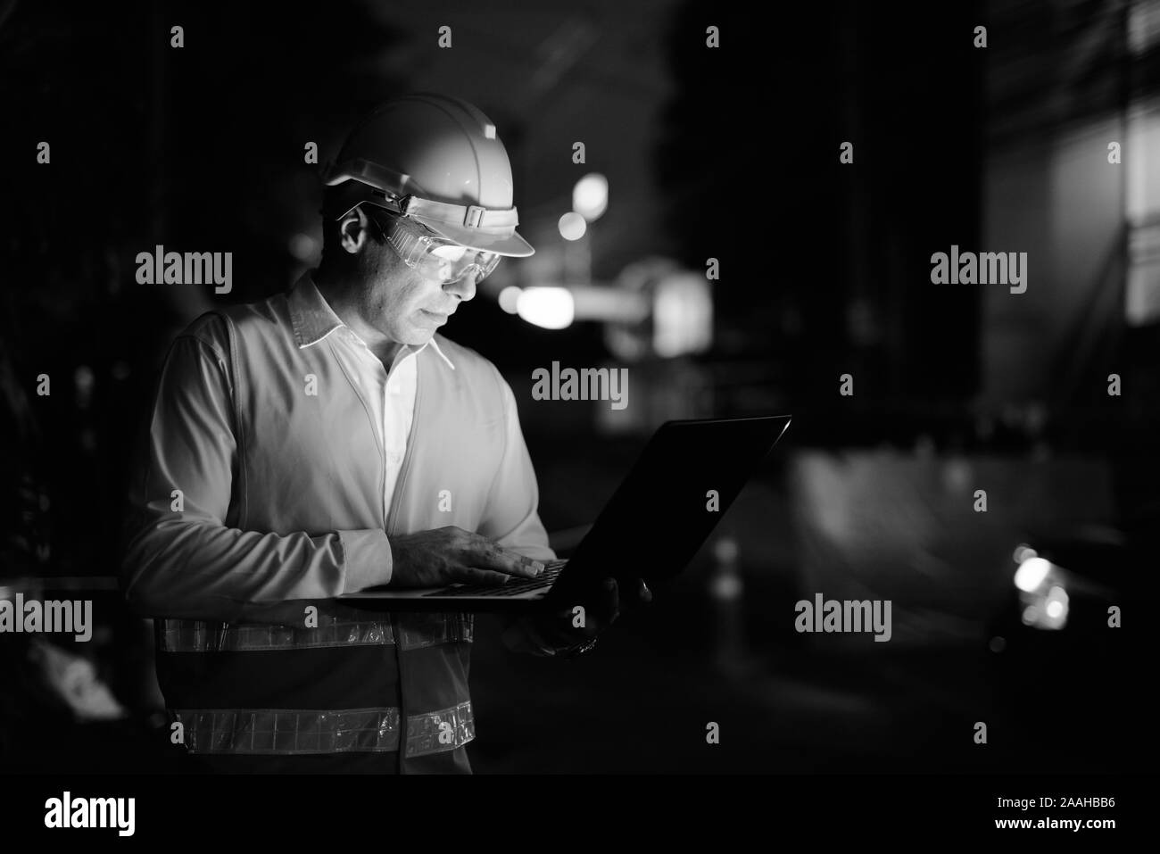 Handsome Persian man construction worker at the construction site at ...