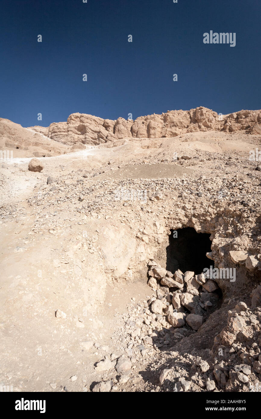 Unexplored Egyptian tomb. One of many tomb entrances lying open in the ...