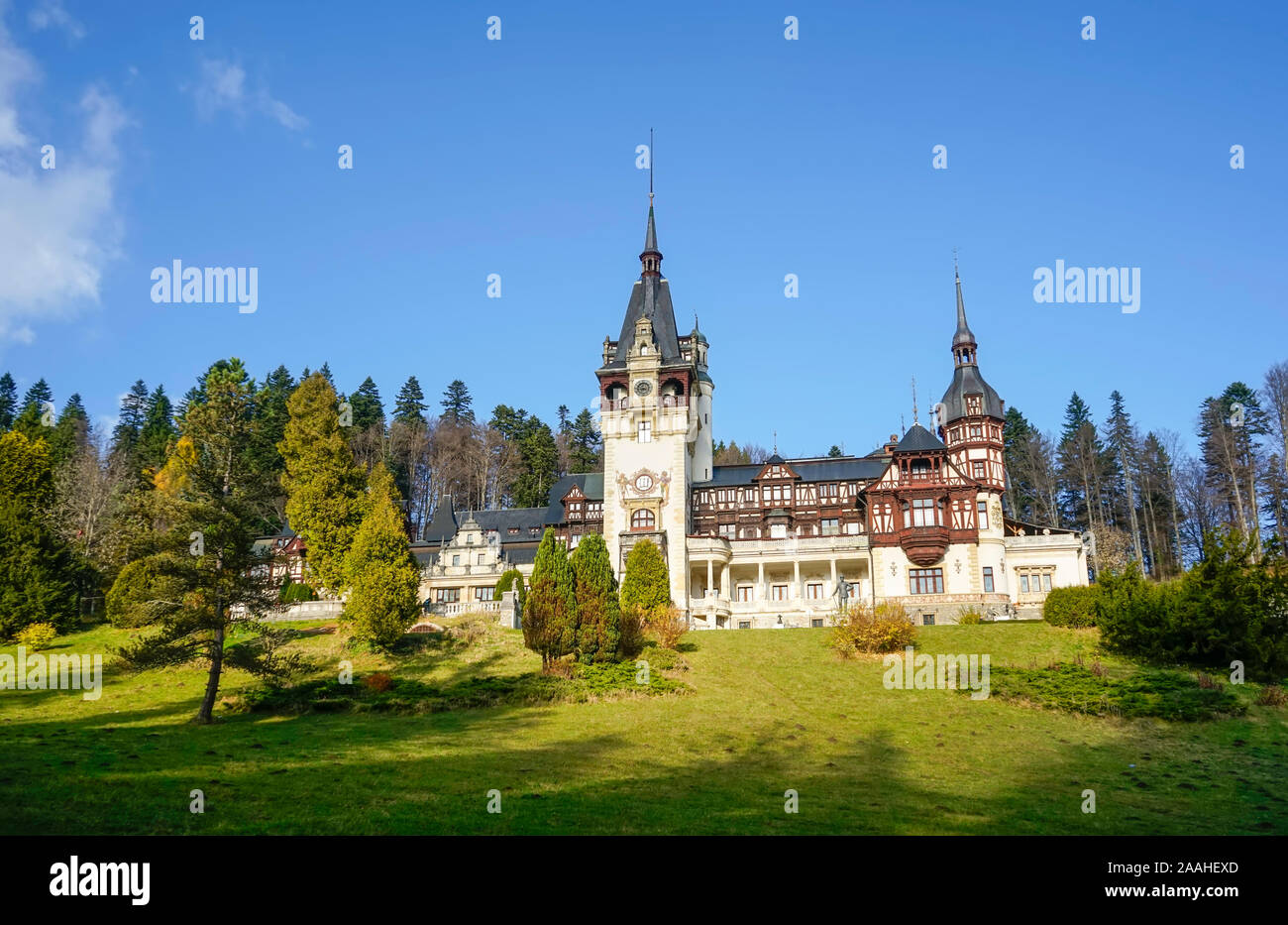 The Peles Castle in Sinaia , Romania , a landmark building which served ...