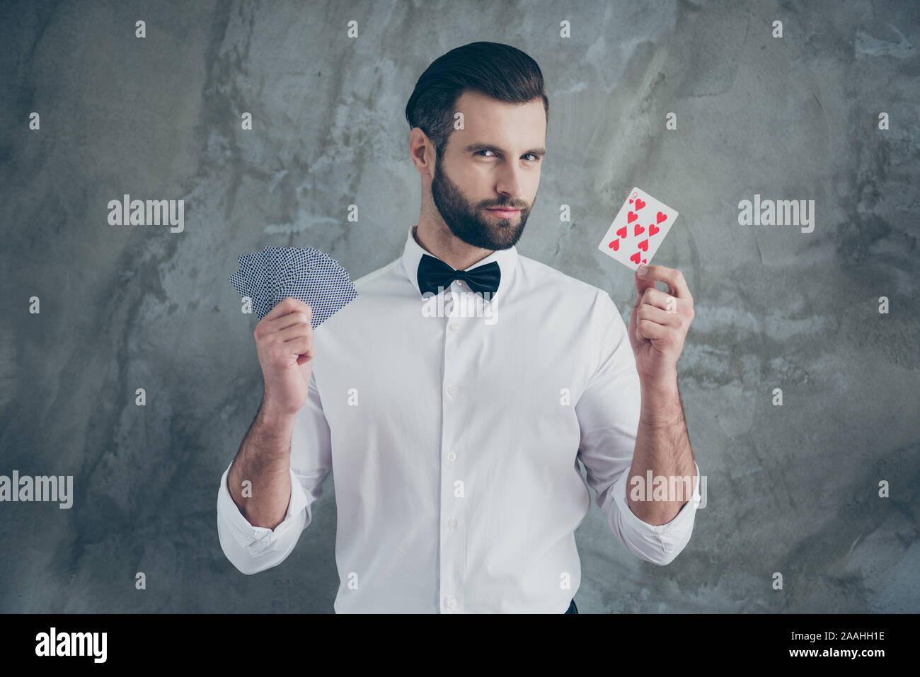 Photo of smart clever card player showing you focuses by demonstrating ...