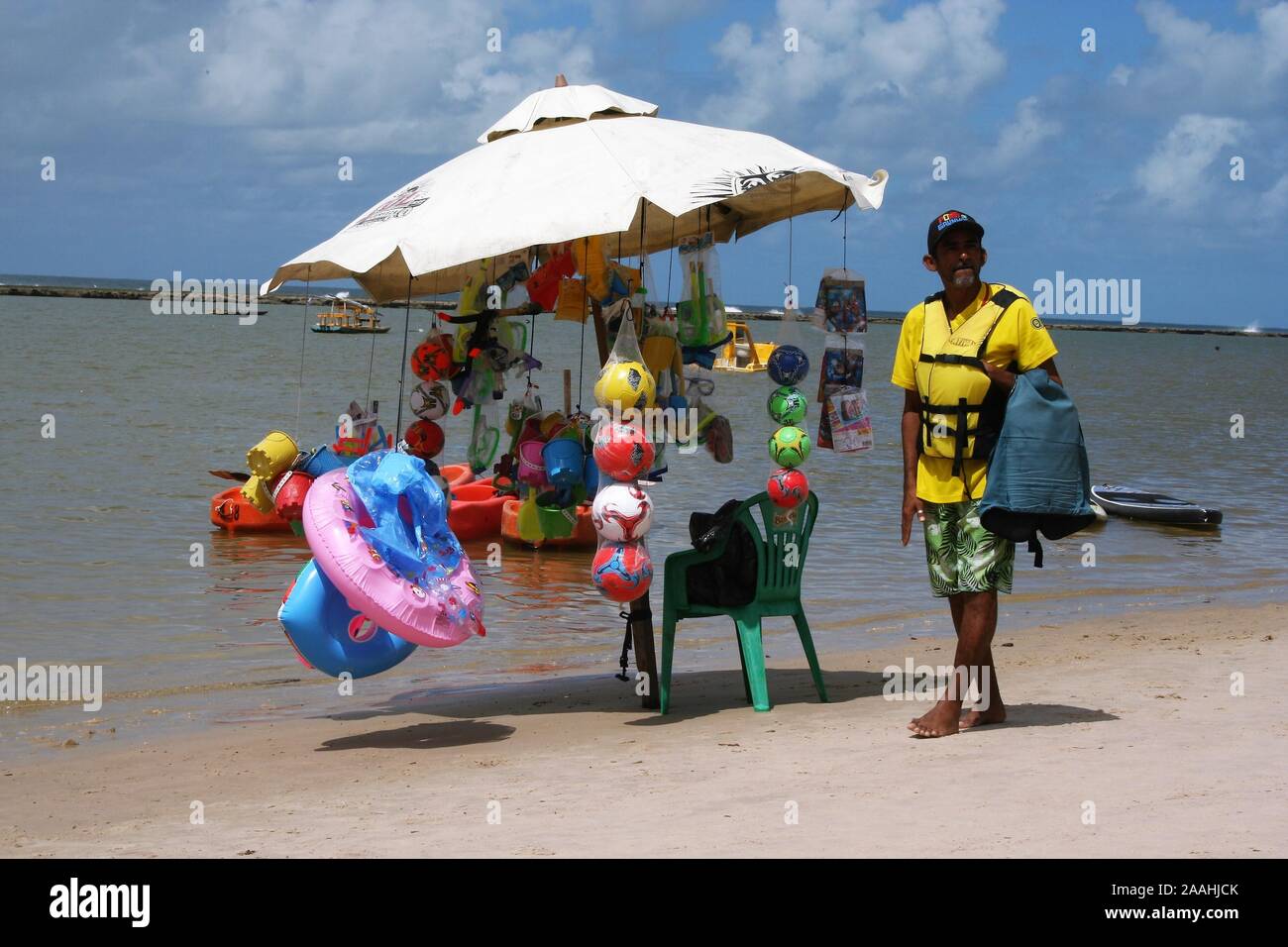 Beach vendor in Porto de Galinhas Stock Photo - Alamy