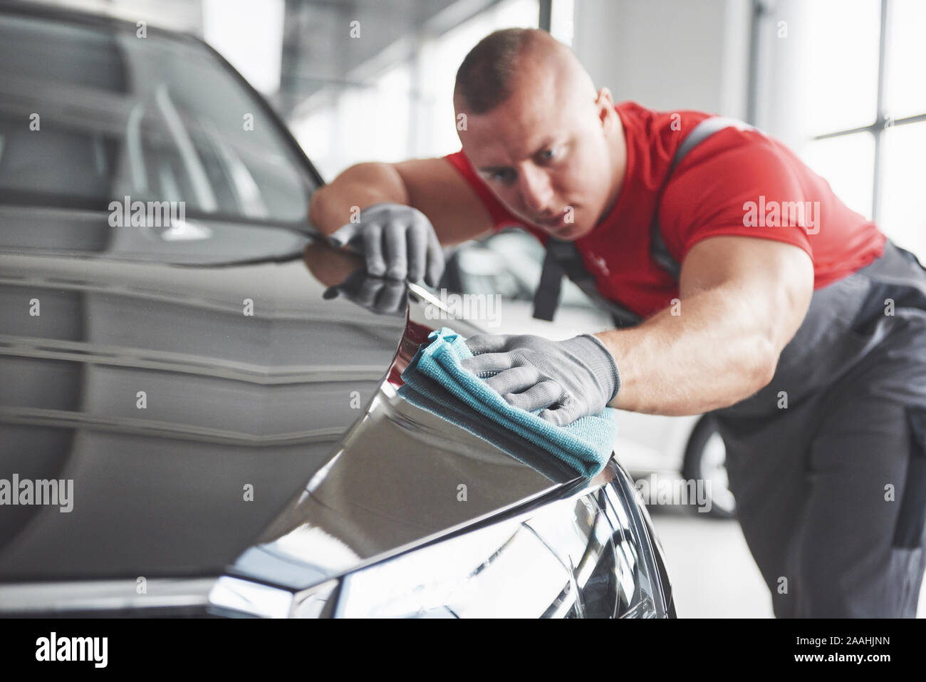 Car care at showroom hi-res stock photography and images - Alamy