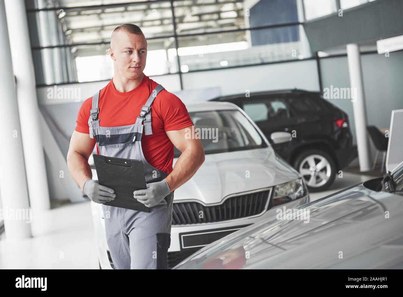 Bearded man mechanic repairing car hi-res stock photography and images ...