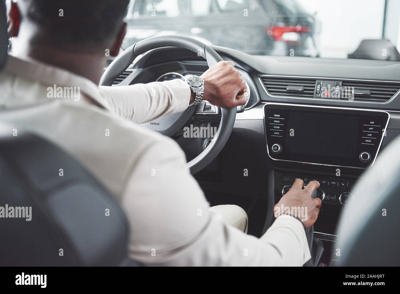 Young black businessman test drive new car. Rich african american man ...
