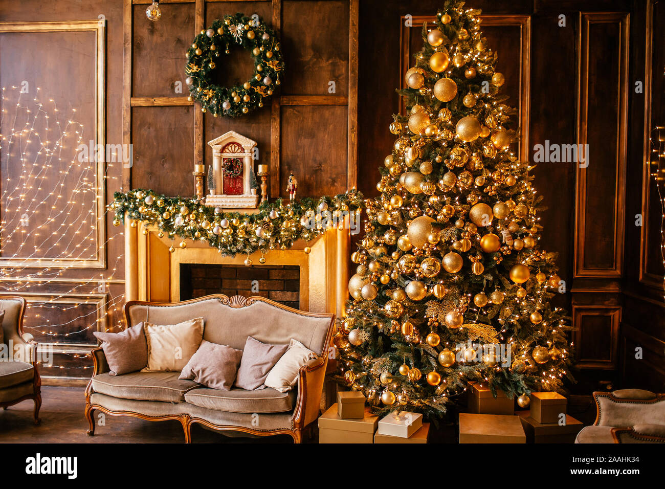 Christmas background with illuminated fir tree with golden decpration ...