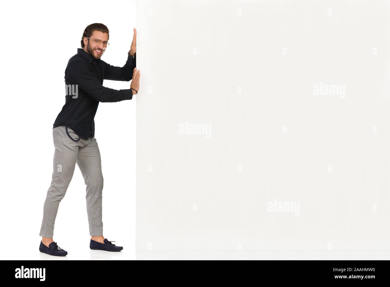 Man pushing wall on white hi-res stock photography and images - Alamy