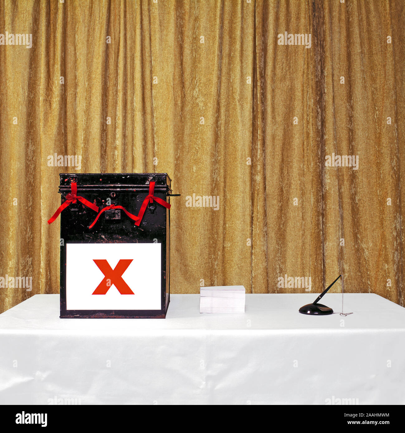 Ballot being cast in voting box hi-res stock photography and images - Alamy