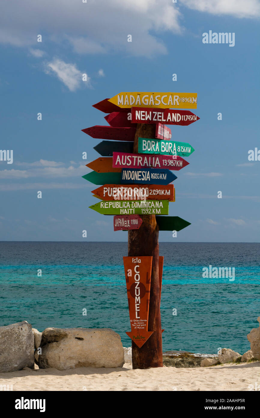 World distances sign post, Punta Sur Eco Park, Cozumel island, Mexico ...