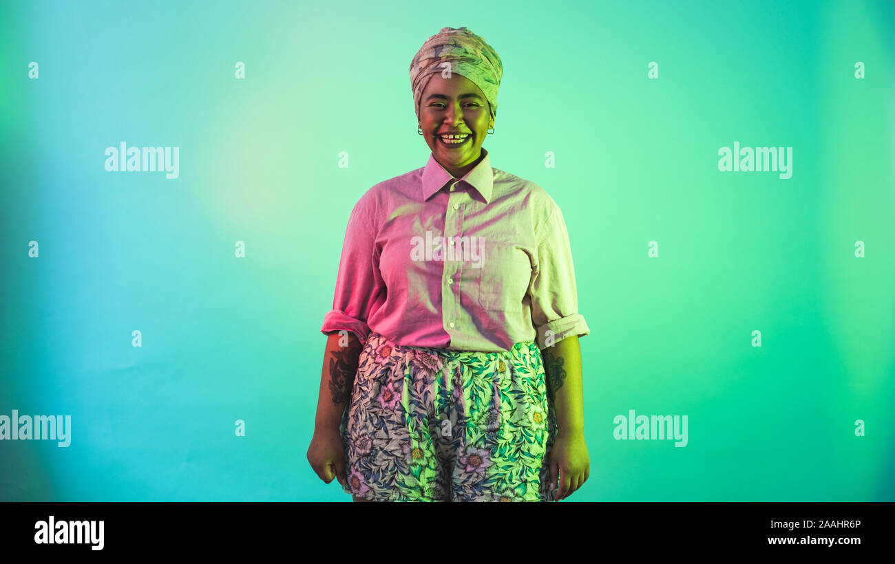 African woman in turquoise hi-res stock photography and images - Alamy