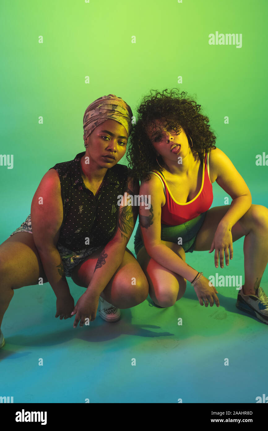 Women squatting hi-res stock photography and images - Alamy