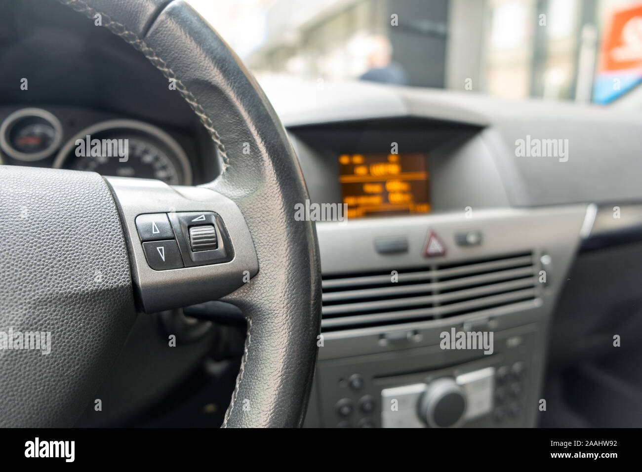 Closeup detail view of a steering wheel of a car Stock Photo - Alamy