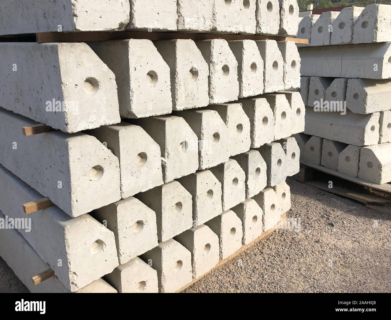 Piled concrete curbstones. Construction material for road construction ...