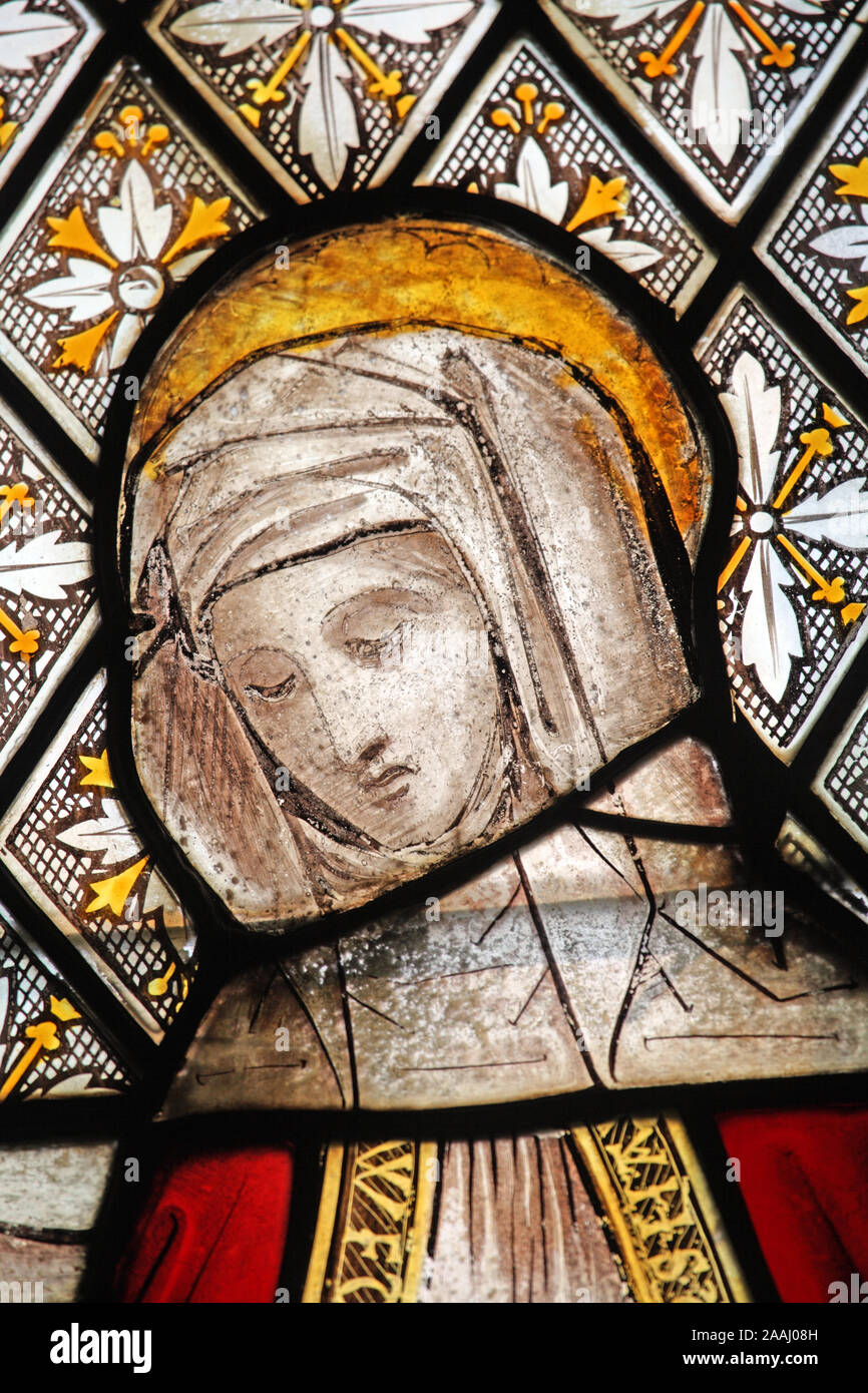 Detail from a medieval stained glass window depicting Saint Anne, St ...