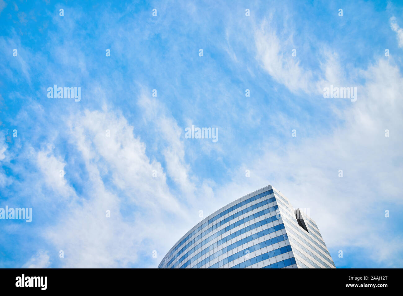 The top of a modern skyscraper or commercial building with glass ...