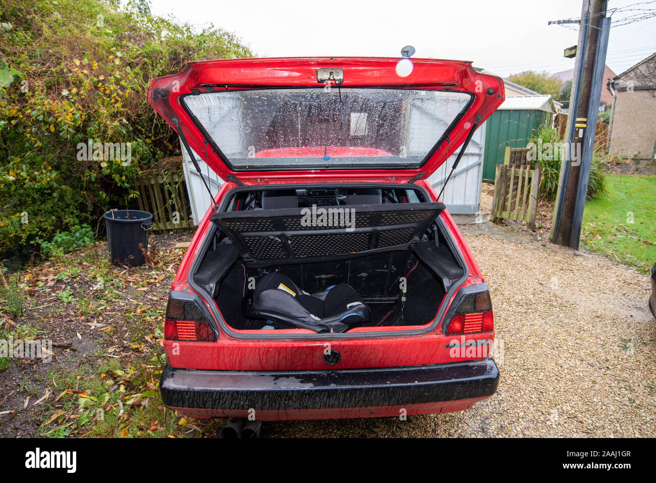 Classic Volkswagen Golf GTI red: Car crash damage and details close up ...