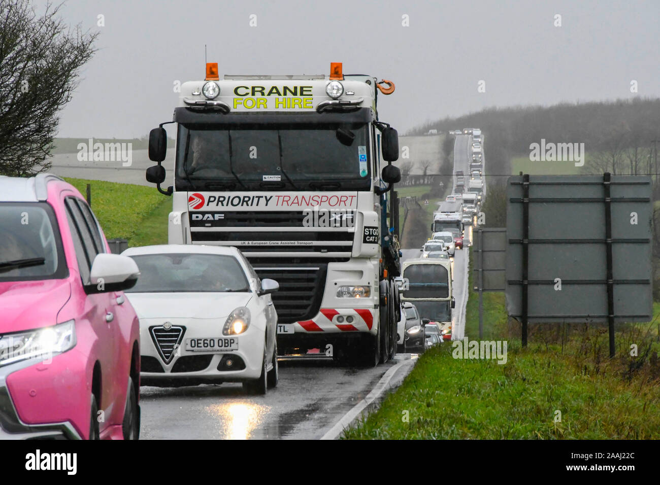 Vehicles go through rain hi-res stock photography and images - Alamy