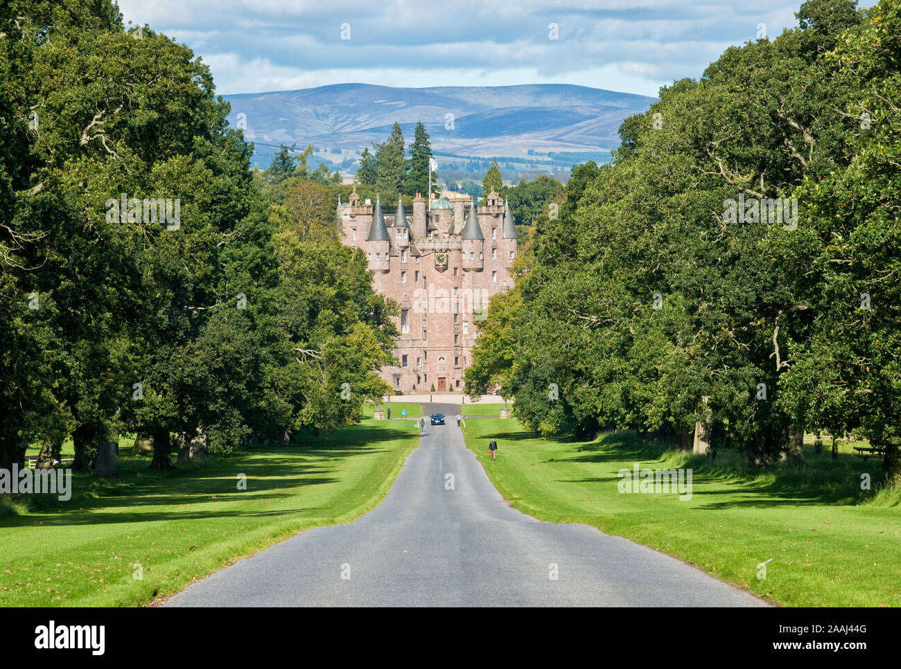 Long tree lined driveway to Glamis Castle. Pertthshire, Scotland Stock ...